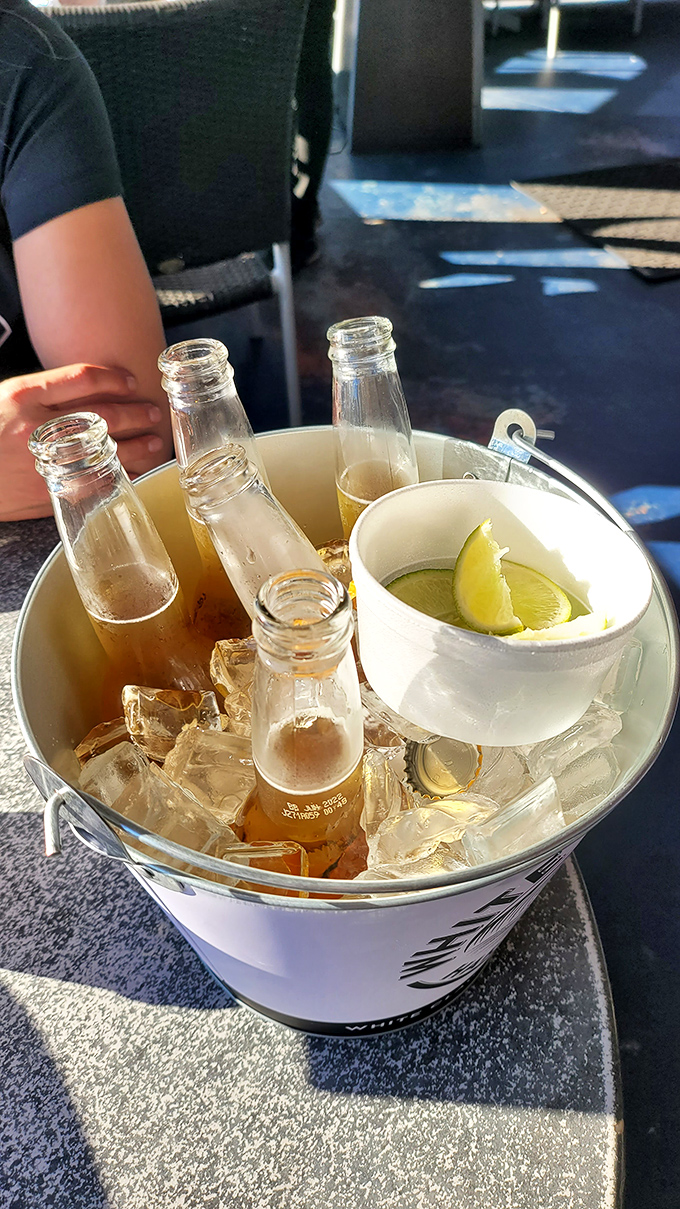 When beer comes in a bucket with lime, you know you're about to have the kind of afternoon that turns into evening without noticing.