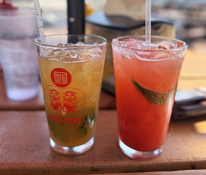 Colorful drinks that promise refreshment but deliver something better—a momentary vacation in a glass, complete with proper straws.