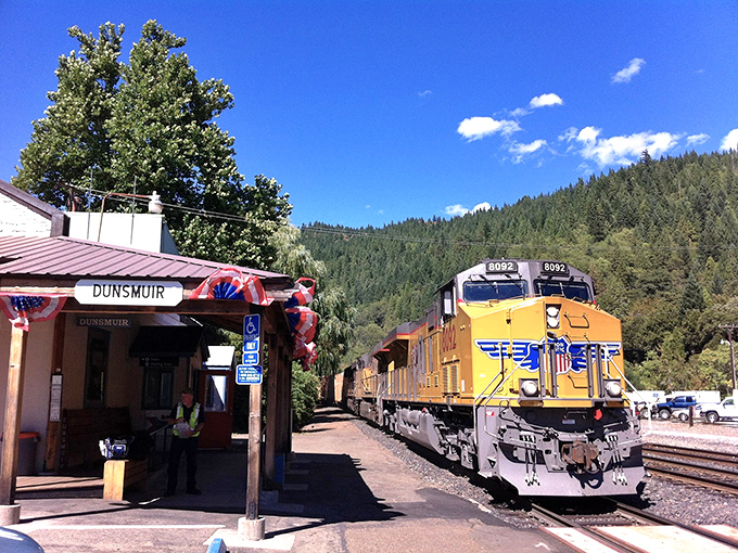 The Dunsmuir train depot welcomes the Union Pacific with mountains standing guard&mdash;a daily reminder of the town's railroad heritage.