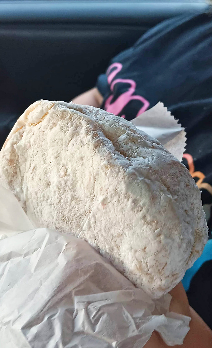 Car donuts: the ultimate road trip companion that turns your vehicle into a rolling dining room with crumbs as souvenirs.