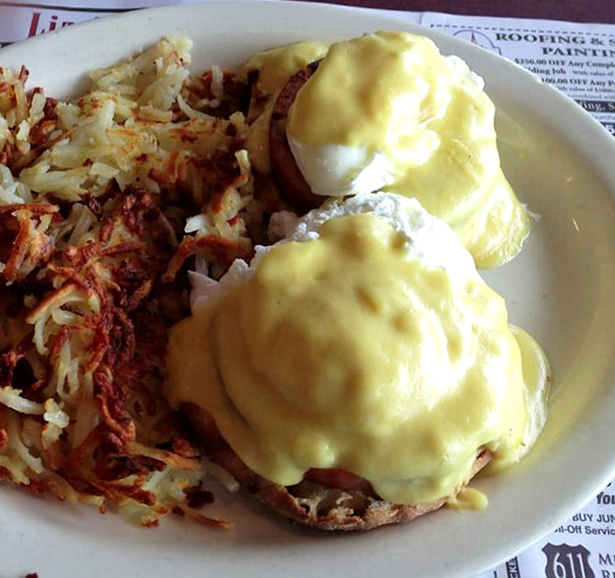 Eggs Benedict that makes morning people out of night owls&mdash;hollandaise sauce flowing like liquid sunshine over perfectly poached eggs.