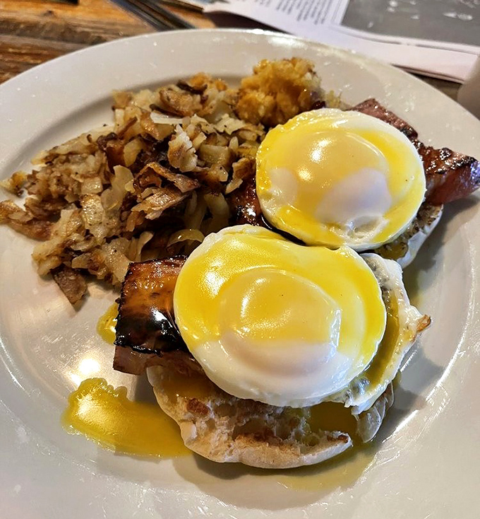 These eggs Benedict aren't messing around &ndash; perfectly poached eggs perched atop ham like mountain royalty. 