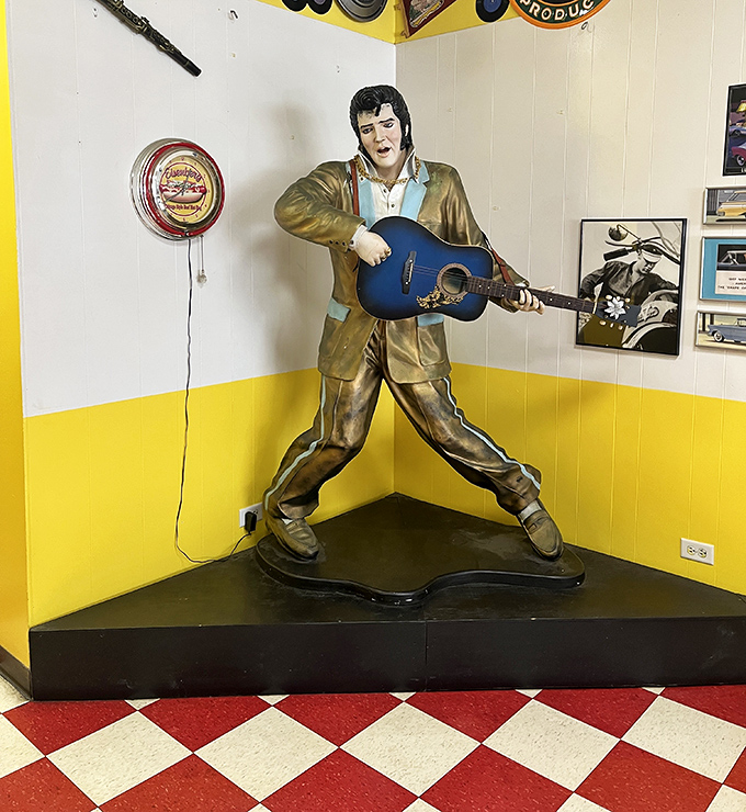 The King himself stands guard in the corner, eternally ready to serenade your hot dog feast with "Love Me Tender."