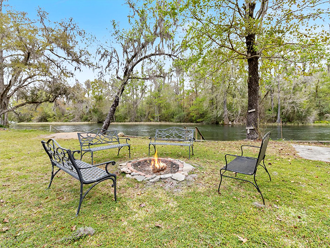 Riverside fire pits where s'mores taste better and ghost stories seem more believable, especially after the sun dips below the cypress trees.