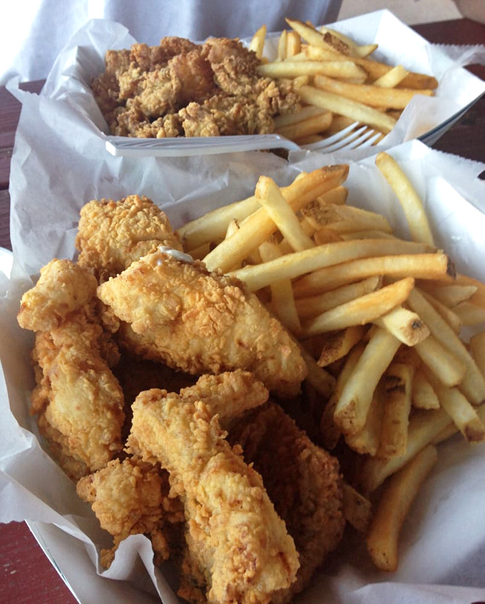 Fried fish so perfectly golden, it makes you want to write poetry about the simple joy of proper technique.