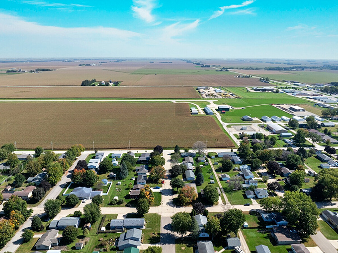 Where farmland meets neighborhood&mdash;Osage's edges blur into the agricultural tapestry that has sustained Iowa for generations.