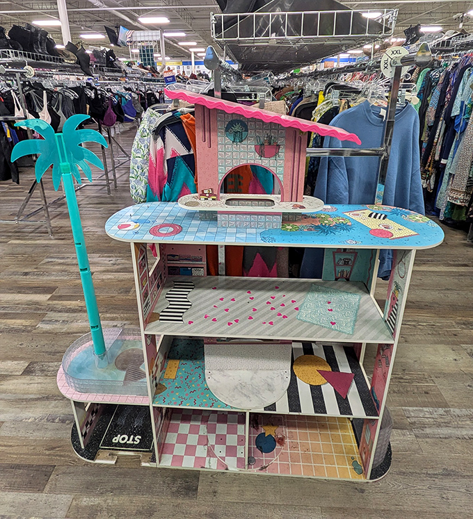 Barbie's dream house got a serious upgrade. This colorful dollhouse with palm tree attachment proves imagination knows no budget constraints.