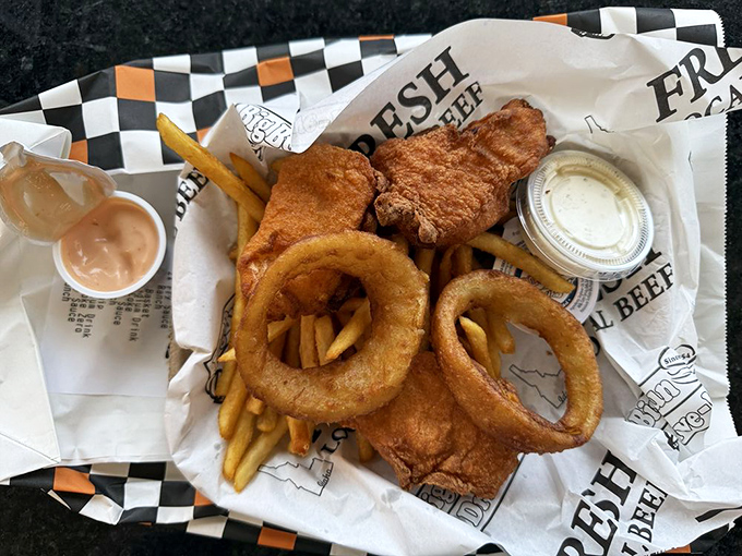 Fish, fries, and onion rings: the triumvirate of fried goodness that makes nutritionists weep and taste buds sing hallelujah in three-part harmony.