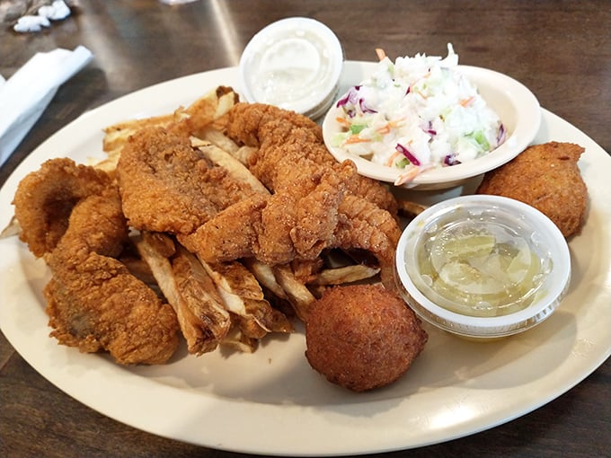 Fried catfish that tastes like summer at the lake. The hushpuppies and slaw aren't just sides; they're supporting actors deserving their own award.