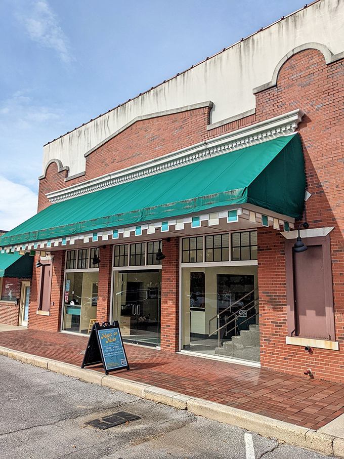 Behind this emerald awning and classic brick façade, the Florida Chautauqua Theatre stages small-town magic that rivals any big-city production – minus the parking nightmare.
