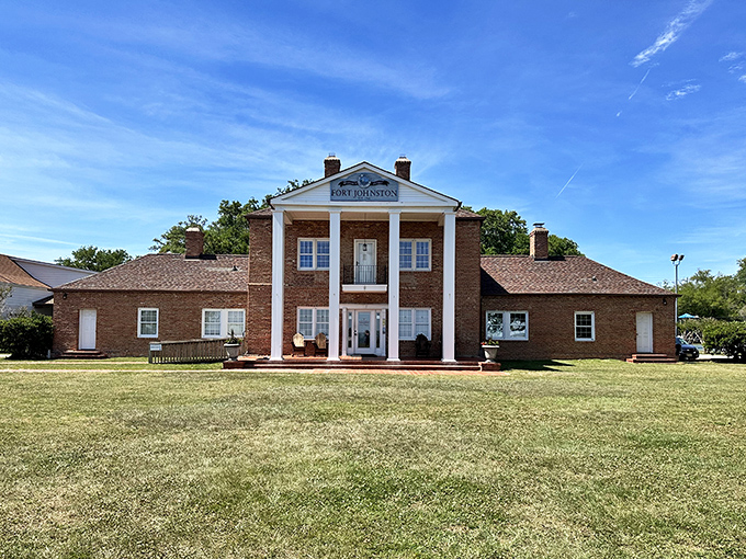Fort Johnston stands as Southport's architectural elder statesman, with columns that have witnessed centuries of coastal history. That lawn has stories to tell.