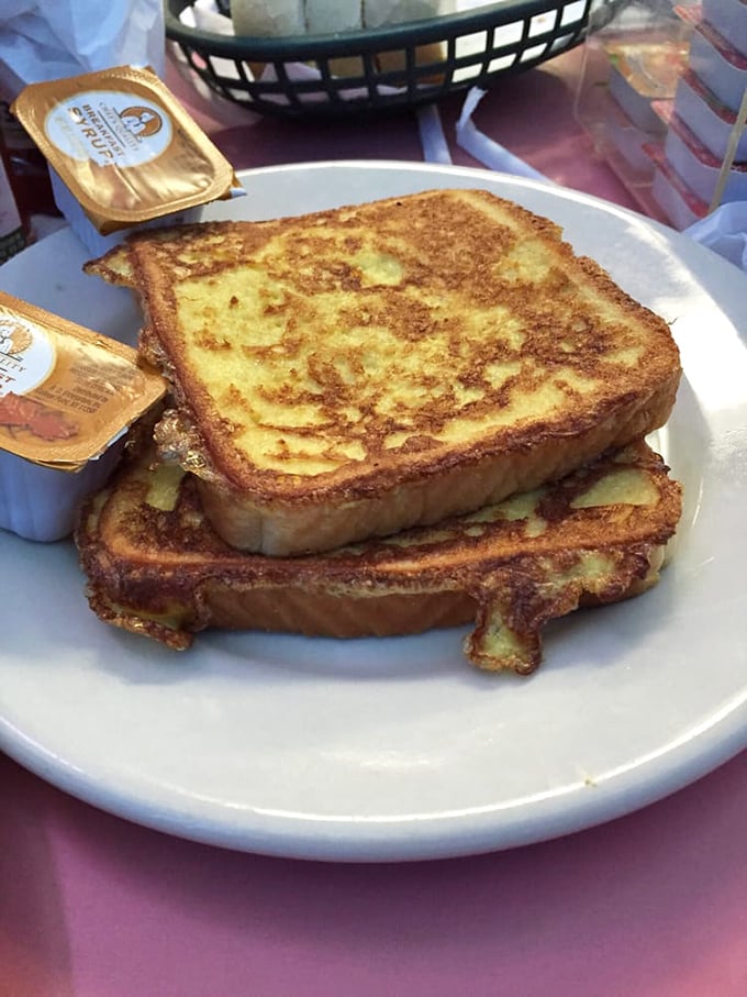French toast so perfectly golden it belongs in Fort Knox, not just on your breakfast plate.