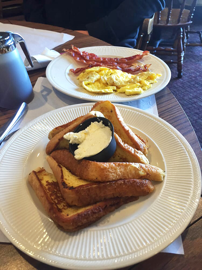 French toast that makes you understand why people line up in the morning cold &ndash; golden, crisp edges giving way to custardy centers.