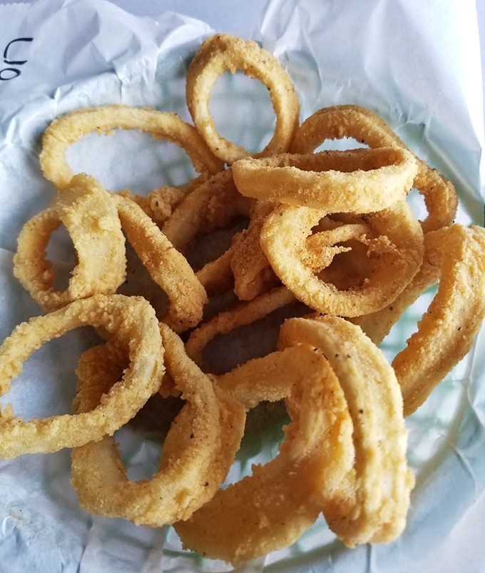 Perfectly breaded calamari rings that manage to be tender inside and crispy outside without requiring a engineering degree to achieve.