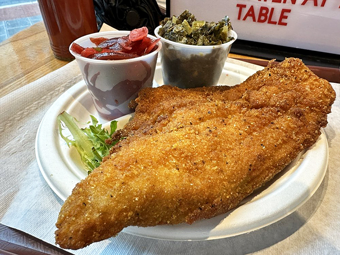 This isn't just fried catfish; it's a masterclass in simplicity. Crispy exterior giving way to flaky white fish that needs no apology.