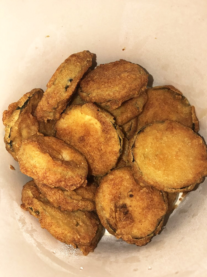 Fried eggplant discs that could convert any vegetable skeptic. Crispy on the outside, tender within&mdash;nature's chicken alternative done right.