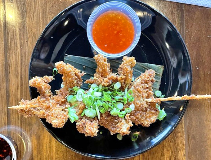 Crispy squid that would make calamari everywhere hang their tentacles in shame &ndash; golden, crunchy, and ready for dipping.