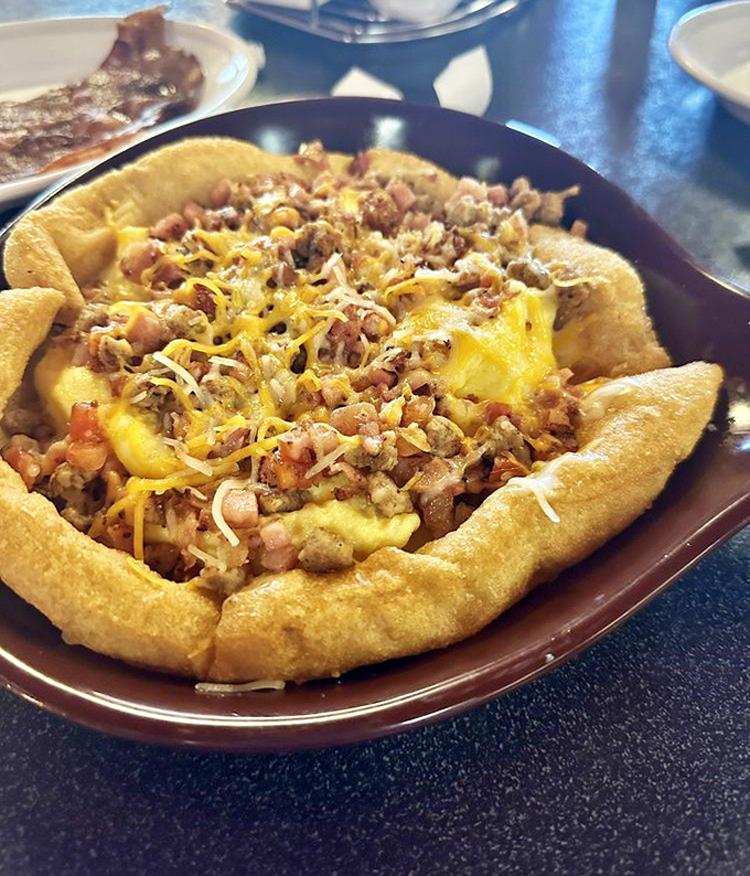 Fry bread breakfast pizza &ndash; a South Dakota twist that combines crispy dough with savory toppings for a morning masterpiece.