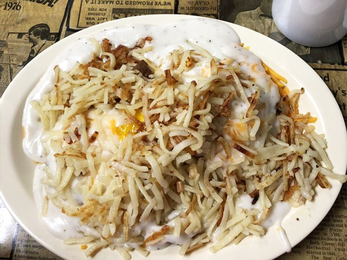 What locals affectionately call the "garbage platter"&mdash;a beautiful mess of eggs, hash browns, and cheese that proves sometimes disorder tastes better than precision.