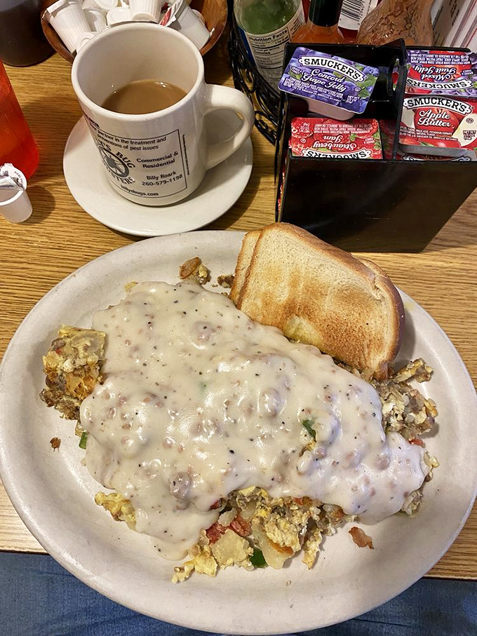 They call it "garbage" with affection&mdash;a glorious mess of eggs, cheese, and breakfast meats that somehow transforms morning hunger into pure contentment.