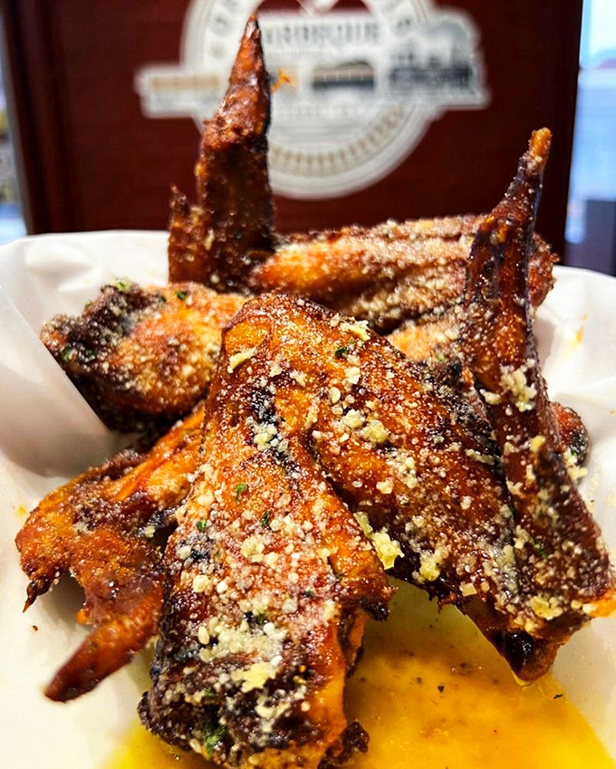 Garlic parmesan wings that look like they've been dusted with savory snowfall&mdash;crispy, aromatic, and worth every napkin you'll need afterward.