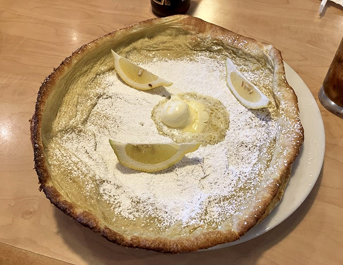 This powdered sugar-dusted German pancake with lemon wedges is what breakfast dreams are made of&mdash;part dessert, part morning miracle.