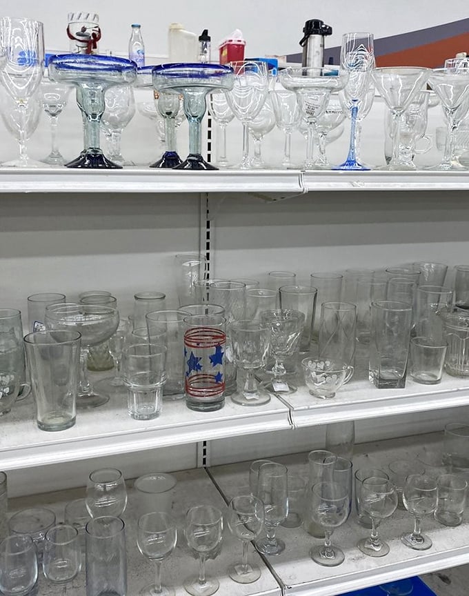 Glassware galore! From everyday tumblers to fancy stemware, it's like every dinner party from 1965 to yesterday donated their best drinking vessels.