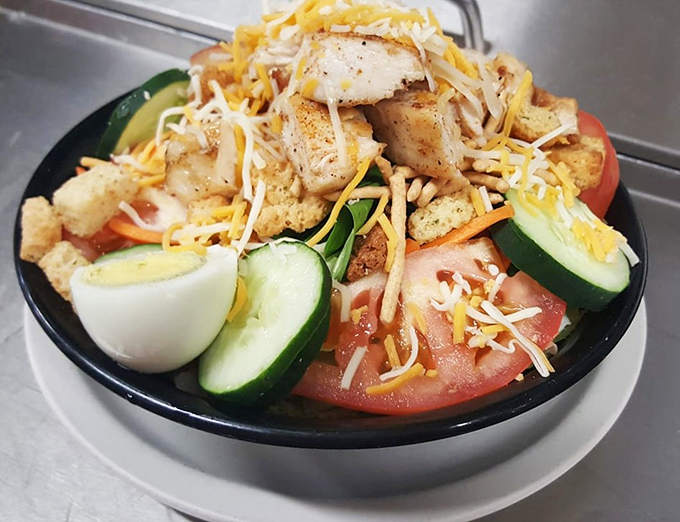 A salad that doesn't apologize for being healthy&mdash;it's too busy being delicious with fresh vegetables and perfectly grilled chicken.