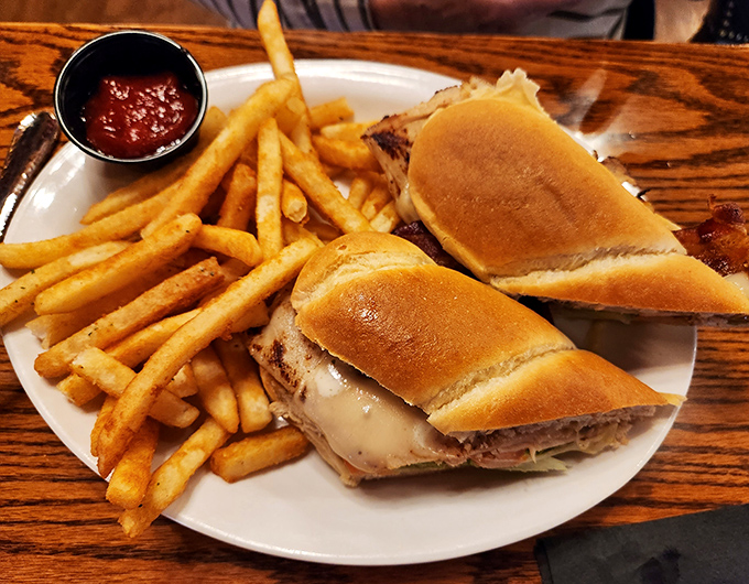 This sandwich isn't messing around &ndash; golden fries, melty cheese, and enough substance to fuel you through a rodeo or business meeting.