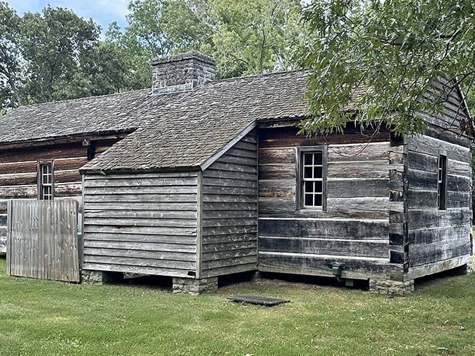 Grinder's Stand reconstruction takes you back to frontier days. History preserved in weathered logs and simple windows.
