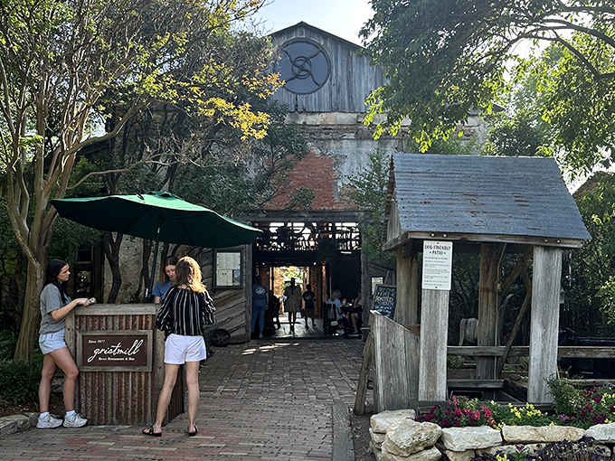 The Gristmill transforms old cotton gin ruins into riverside dining, proving Texans can make anything delicious given enough ingenuity and bricks.