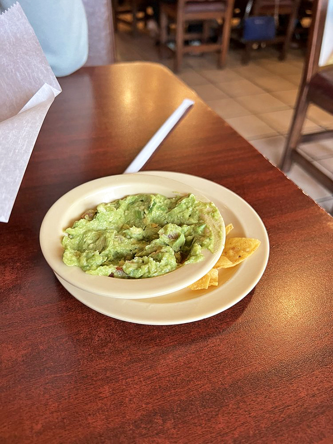 Guacamole so fresh and vibrant it practically photosynthesizes on the plate. Those few tortilla chips are merely suggested delivery vehicles for this green gold.