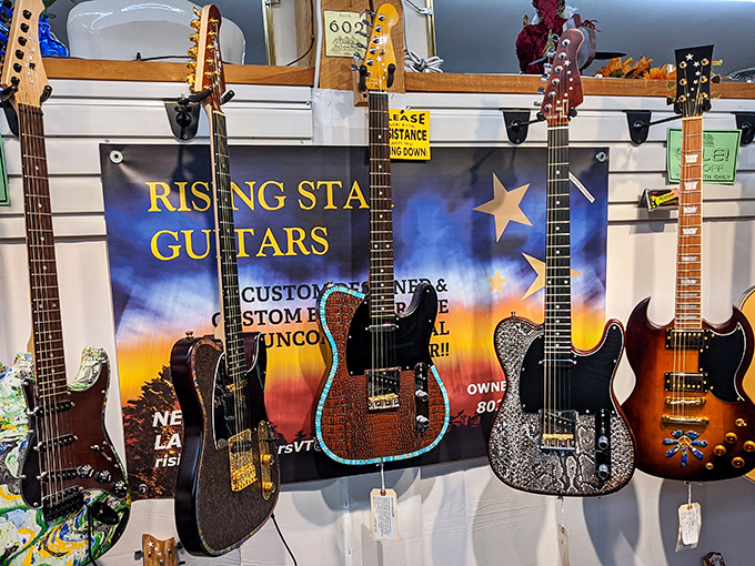 Six-string dreams on display. Each guitar silently humming with potential rock stardom and bedroom mirror concerts yet to come.