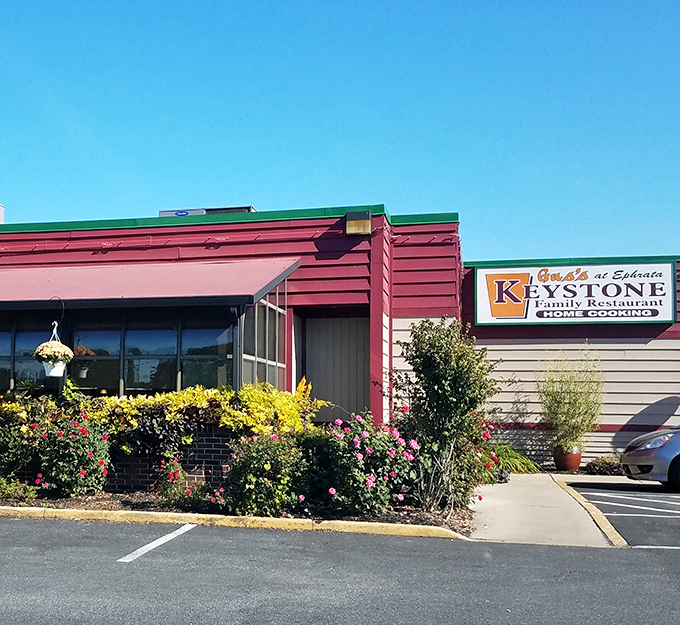 Gus's Keystone Family Restaurant blooms with flowers almost as colorful as the conversations happening inside over bottomless coffee cups.