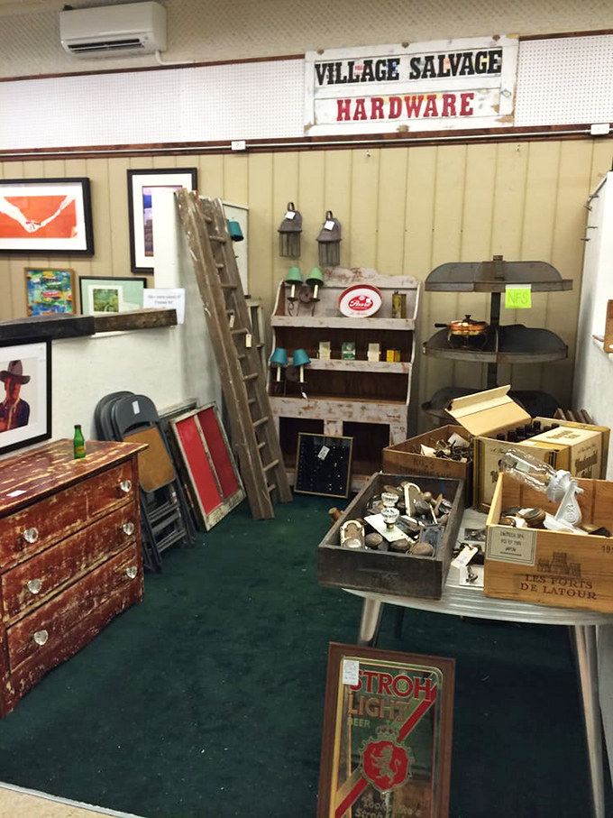 The "Village Salvage Hardware" section proves one generation's junk drawer contents become another's carefully curated vintage collection. Stroh's sign included.