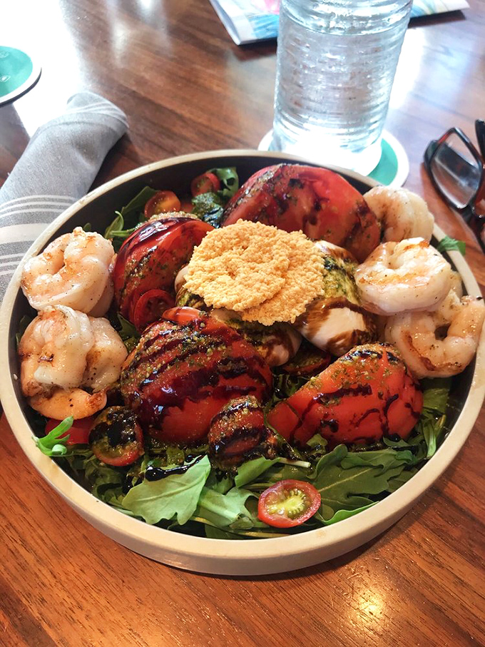 A salad that could convert carnivores. Plump shrimp and grilled tomatoes prove that "eating your vegetables" can be a luxury.
