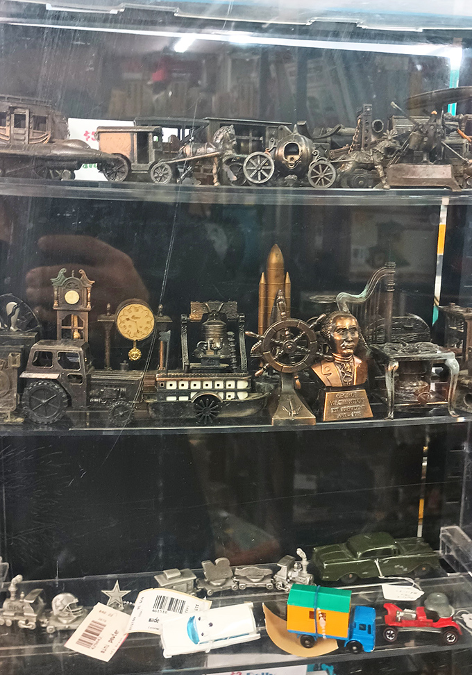 Miniature masterpieces of historical machinery capture America's industrial past in bronze, perfect for the desk of any history buff.