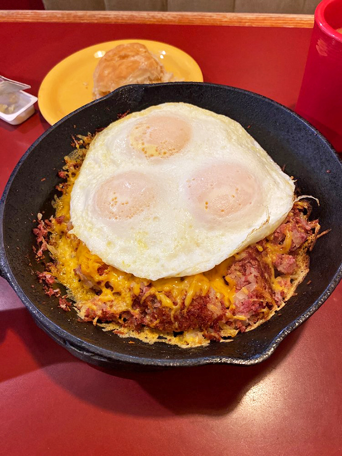 The Hobo Skillet &ndash; where eggs, corned beef hash, and melted cheese create a breakfast democracy where every ingredient gets equal representation.