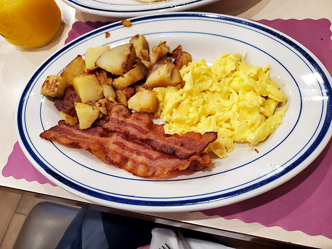 The classic American breakfast trinity&mdash;crispy bacon, fluffy eggs, and golden home fries that could convert even the most dedicated breakfast-skipper.