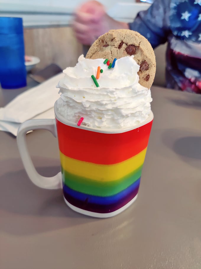 Not just hot chocolate &ndash; it's a rainbow mug of happiness topped with whipped cream and sprinkles. Inner child, activated!