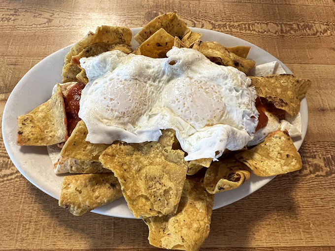 The Mexico City Scramble in all its glory &ndash; perfectly poached eggs nestled atop local tortilla chips, ready to make breakfast dreams come true.