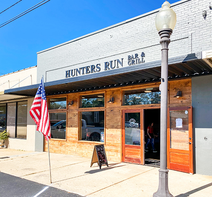 Hunters Run Bar & Grill brings rustic charm to downtown with its wooden facade and American flag&mdash;comfort food awaits behind those doors.
