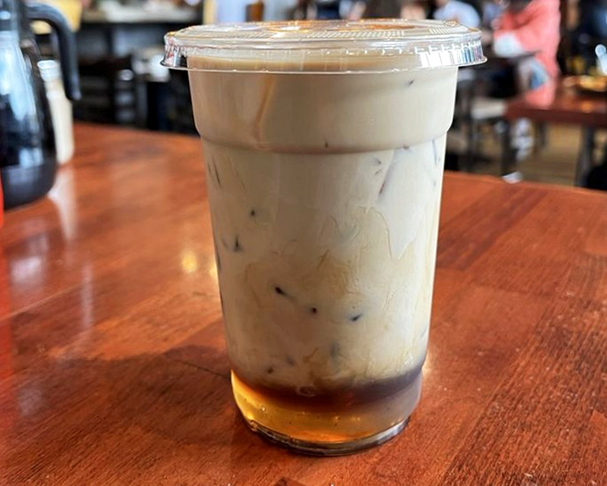 That iced coffee isn't just a beverage—it's a layered work of art that promises to transform your caffeine routine from mundane to magnificent.