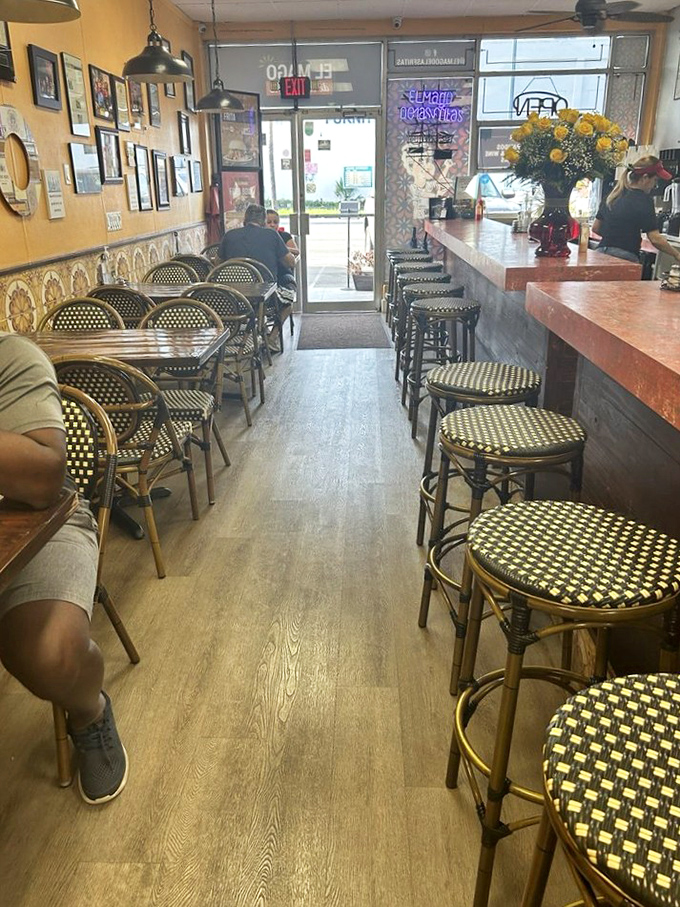 The narrow dining room feels like being invited to someone's home, if that someone happened to be the wizard of Cuban street food.