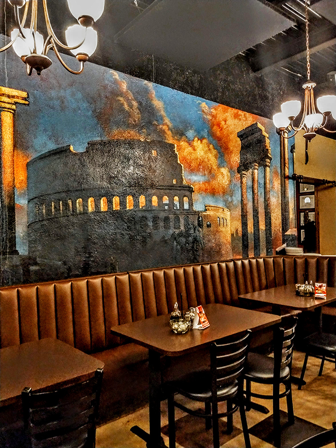 Another angle reveals the Colosseum mural, because nothing says "authentic Italian dining" like ancient Roman architecture watching you eat.