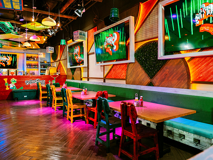 Multicolored chairs that look borrowed from a kindergarten classroom somehow perfectly match the joyful chaos of the dining experience.