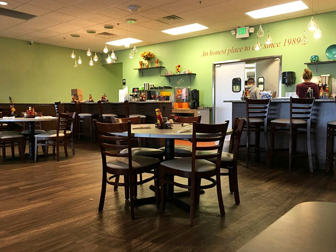 The lime-green walls and comfortable seating arrangement whisper "stay awhile" while your expanding waistline whispers "maybe run later."