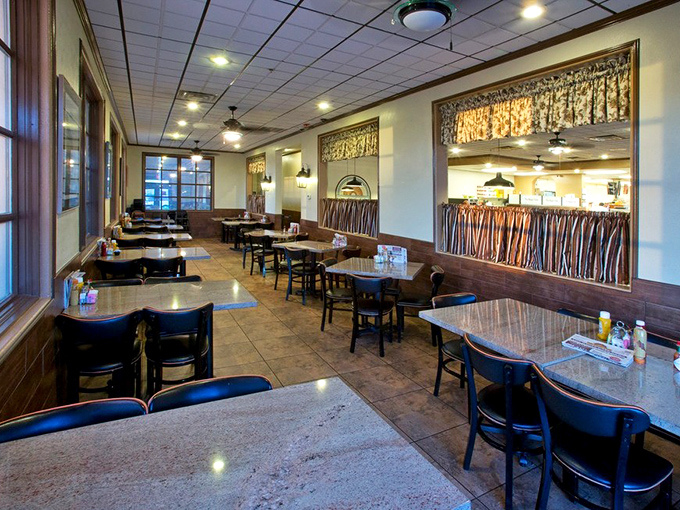 Another dining area showcases the restaurant's warm ambiance, where conversations flow as freely as the coffee refills.