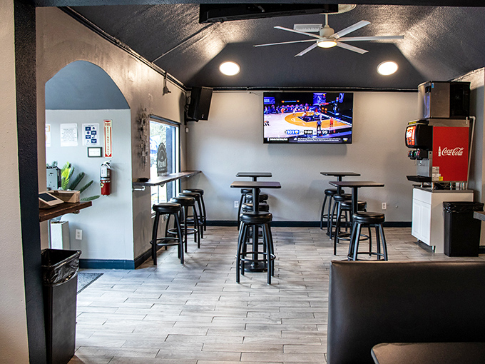 Clean lines, high-top tables, and screens for the game&mdash;this space knows exactly what a neighborhood bar should look like.