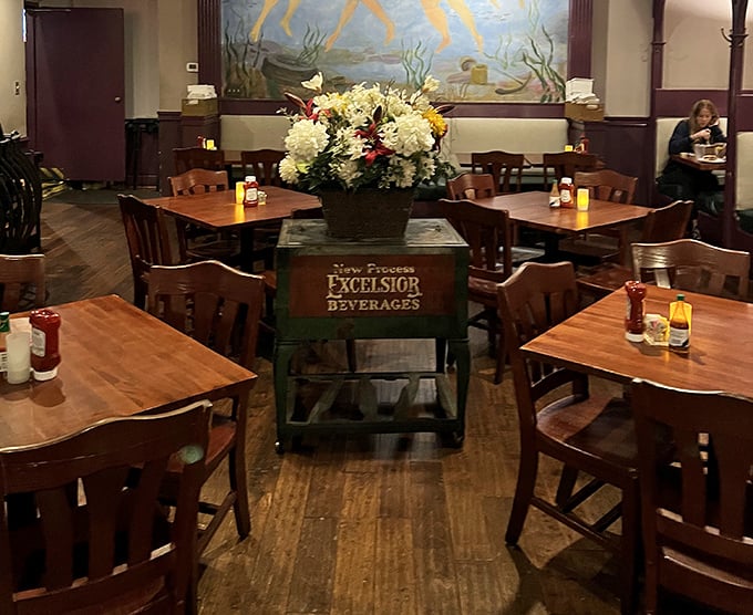 The dining room's understated elegance features a vintage beverage cart centerpiece&mdash;Southern hospitality in its natural habitat.